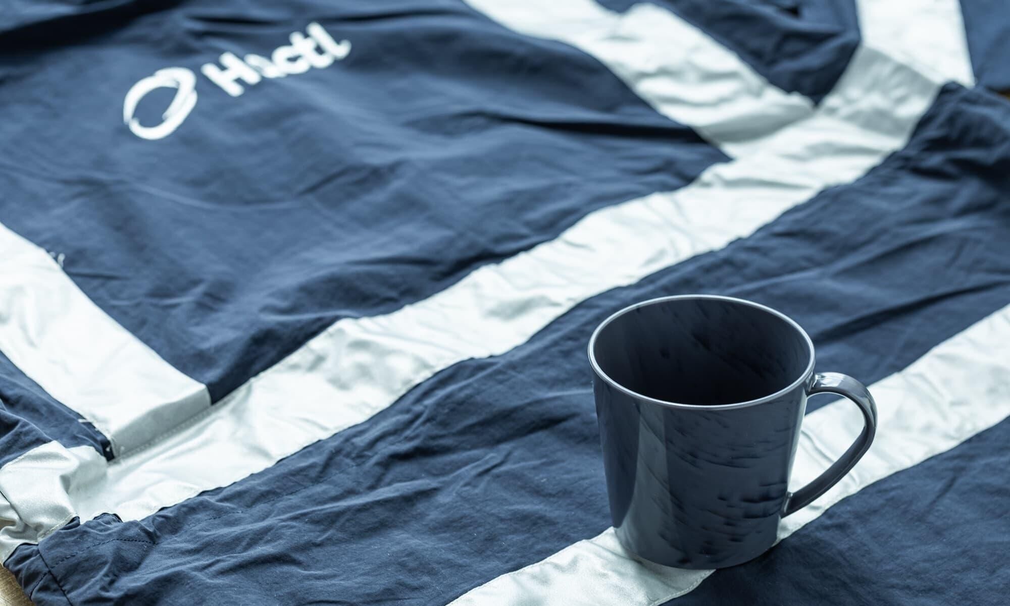 Hactl turns old uniforms into upcycled cups
